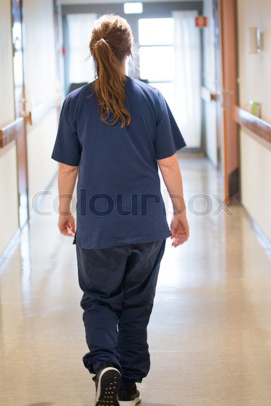 Nurse walking the hospital hall | Stock image | Colourbox