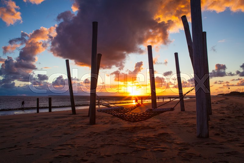 Dramatic sunset on the empty beach, ... | Stock image | Colourbox
