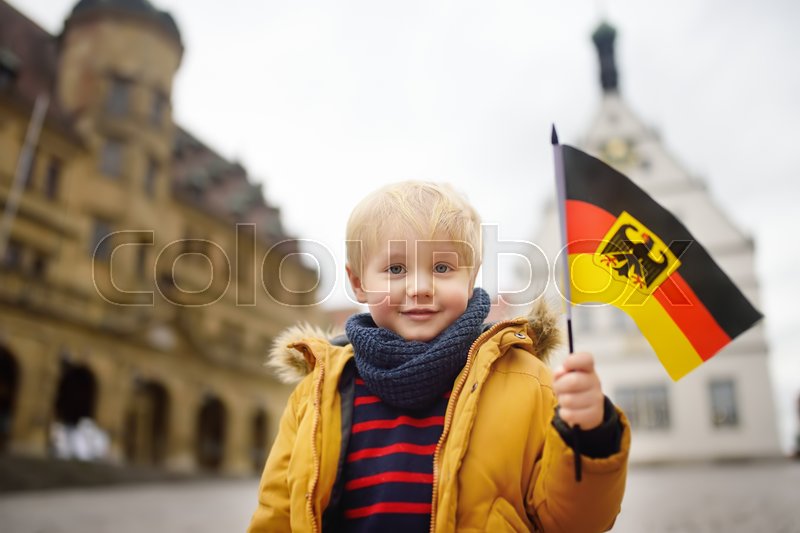 Little boy with a German flag on the ... | Stock image | Colourbox