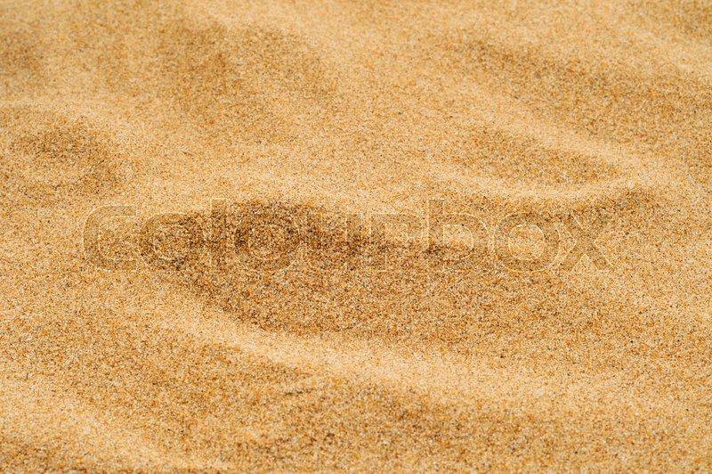 Closeup of a pile of sand of a beach or ... | Stock image | Colourbox