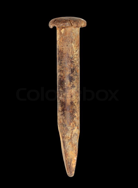 Old rusty nail on a black background | Stock image | Colourbox