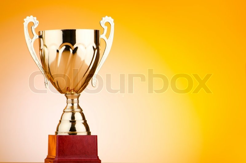 Golden cup against the background | Stock image | Colourbox