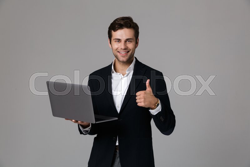 Image of cheerful businessman 30s in ... | Stock image | Colourbox