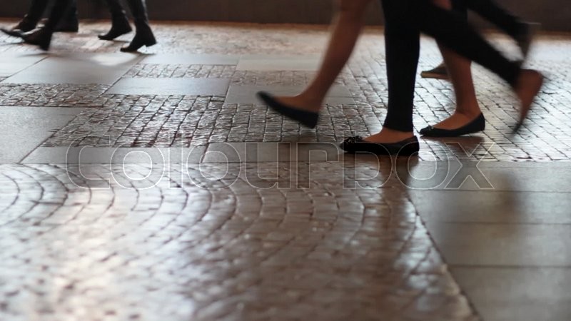 Walking feet on pavement | Stock Video | Colourbox