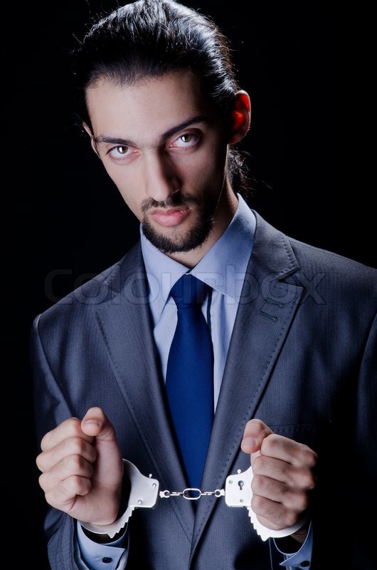 Businessman jailed for his crimes | Stock Photo | Colourbox