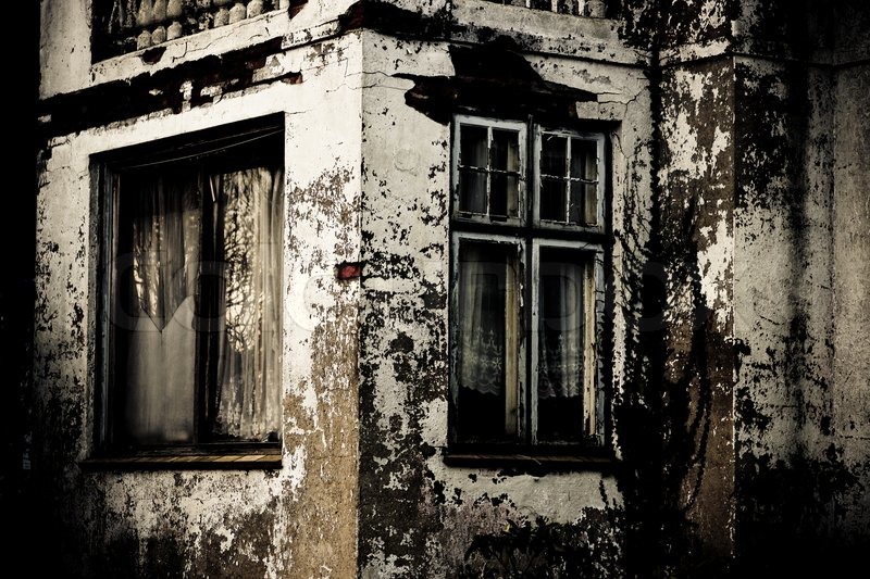 Spooky grunge house with torn windows | Stock image | Colourbox