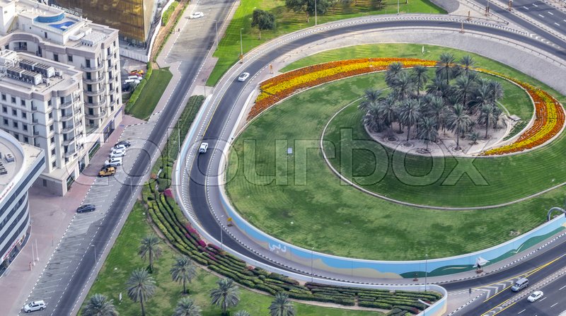 Big roundabout with flowers and grass ... | Stock image | Colourbox