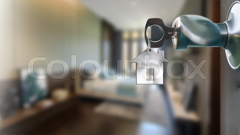 Open door with key in keyhole to modern ... | Stock image | Colourbox