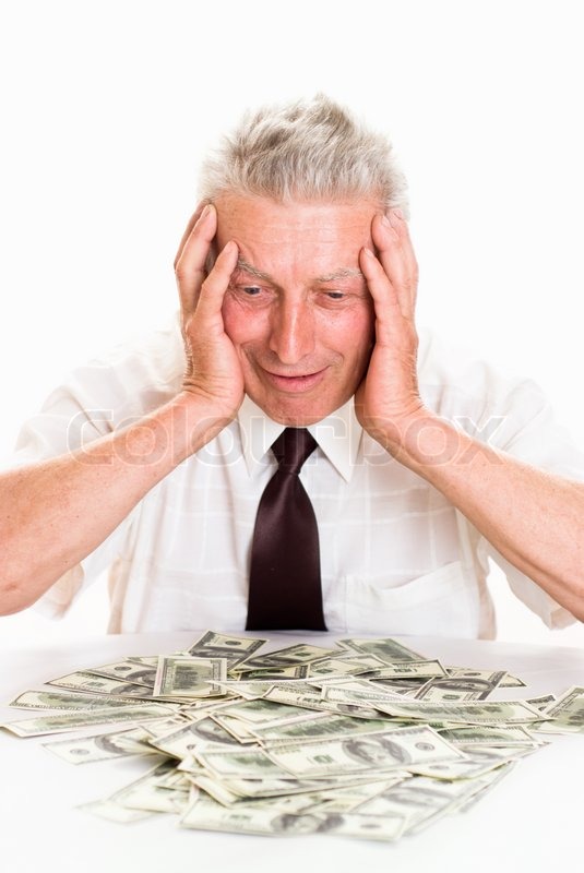 älterer Mann mit Geld | Stock Bild | Colourbox