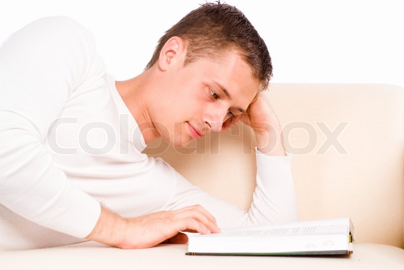 Cute guy reading | Stock image | Colourbox