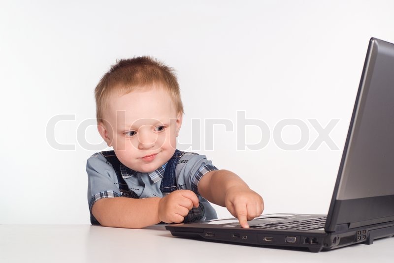 Little boy and computer | Stock image | Colourbox