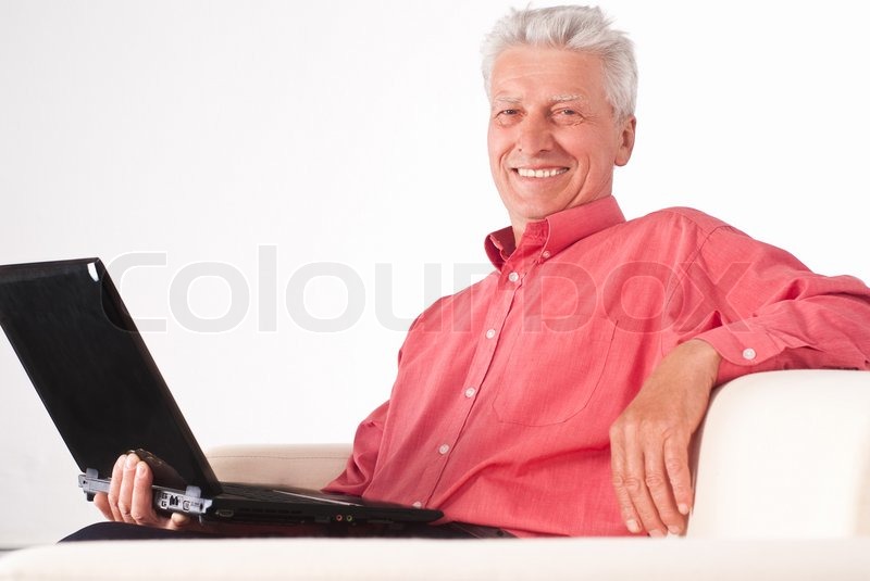 Old man with laptop | Stock image | Colourbox
