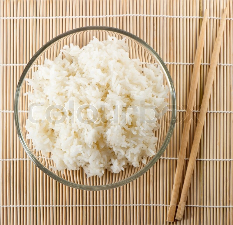 White steamed rice on bamboo background | Stock image | Colourbox