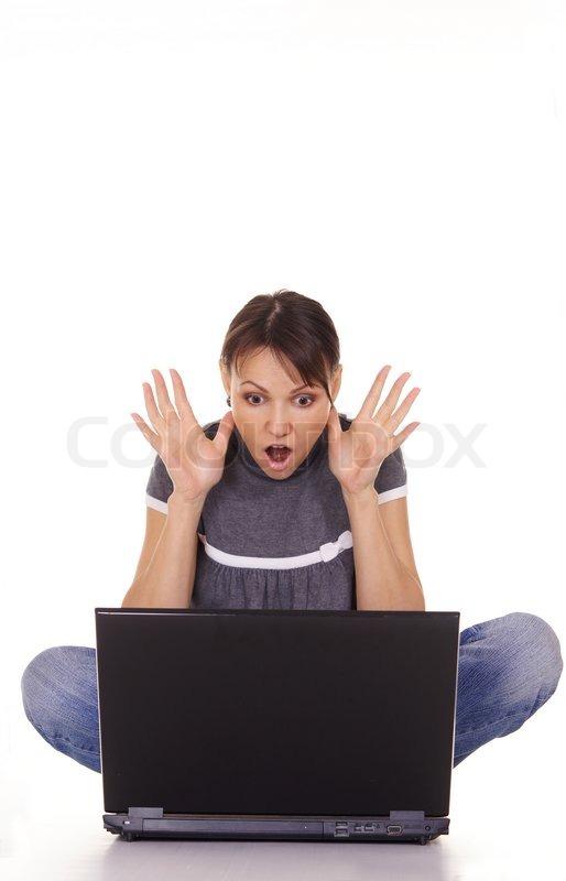 Cute young woman posing with a laptop | Stock image | Colourbox