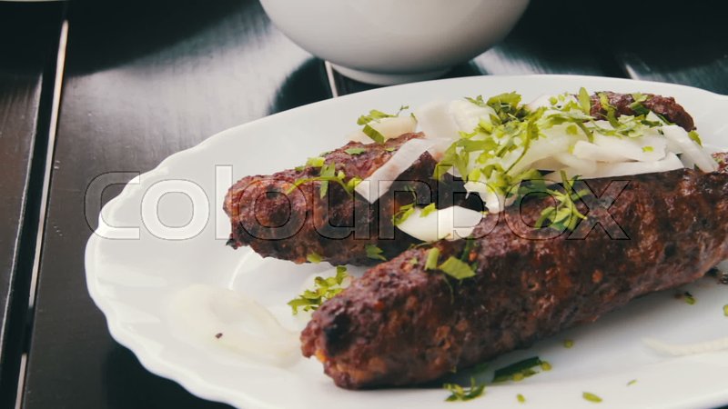 Appetizing kebab on a plate of Georgian ... | Stock video | Colourbox