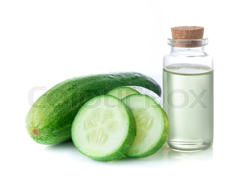 Cucumber slices with cucumber essential ... | Stock image | Colourbox