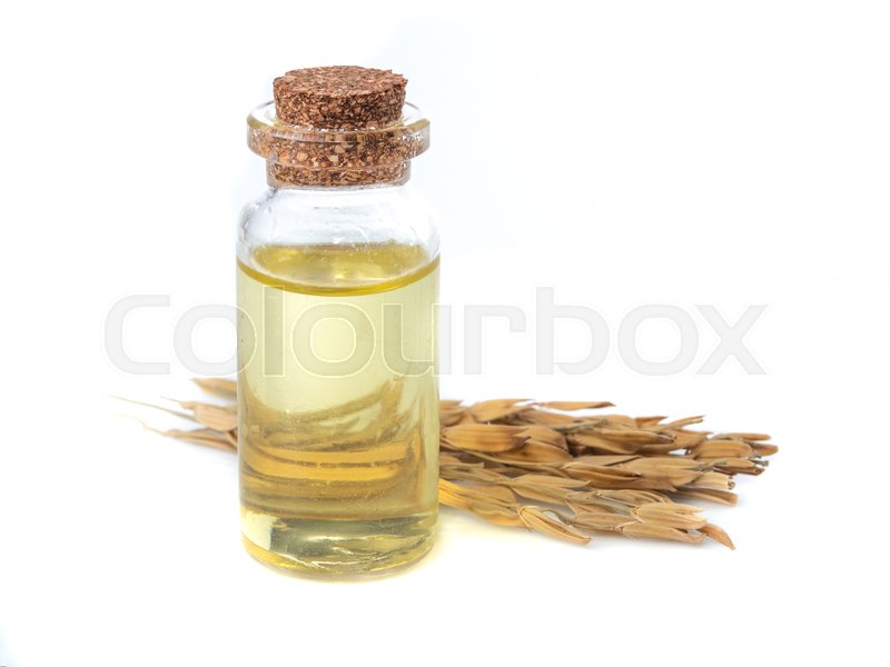Rice paddy with rice bran oil in glass ... | Stock image | Colourbox