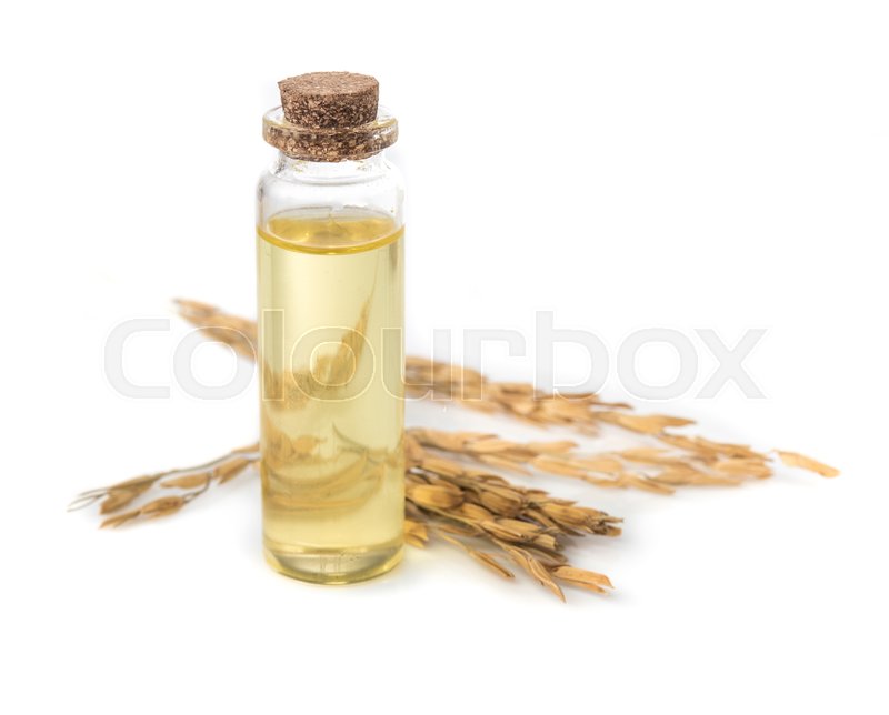 Rice paddy with rice bran oil in glass ... | Stock image | Colourbox