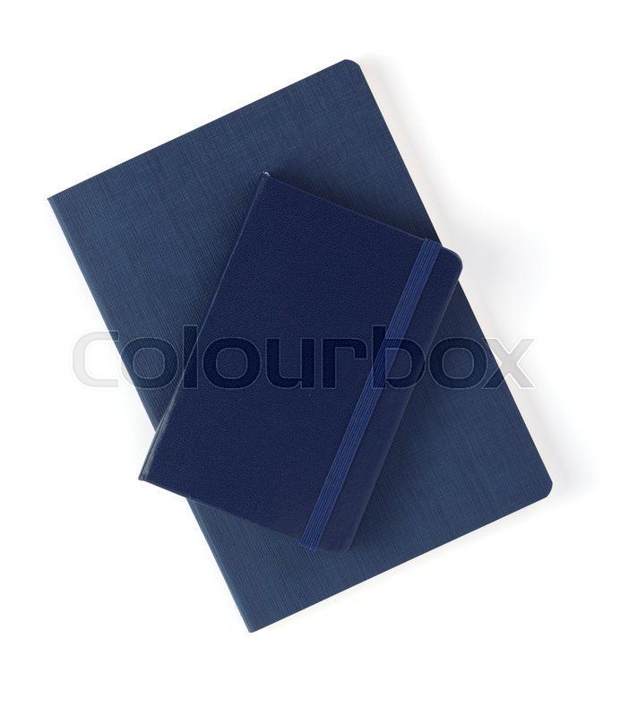 Closed notebook or notepad at white ... | Stock image | Colourbox