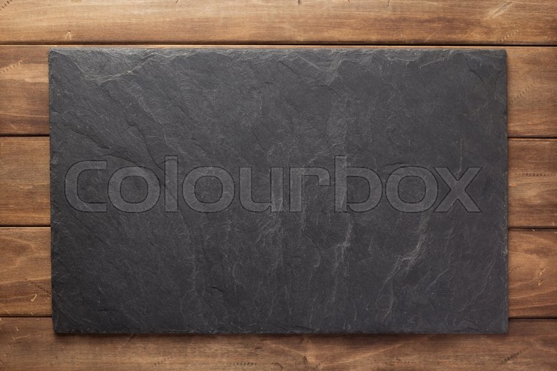 Sign board and wooden background ... | Stock image | Colourbox