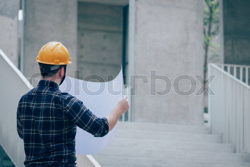 Civil engineer working on building site ... | Stock image | Colourbox