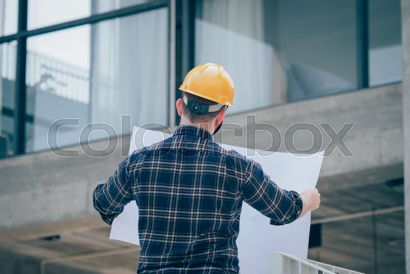 Civil engineer working on building site ... | Stock image | Colourbox