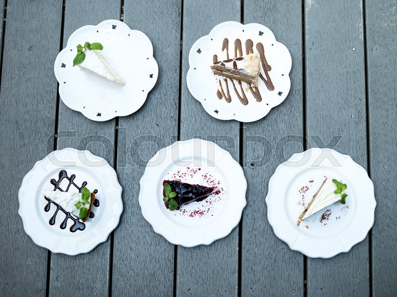 Top view of slice of cake on wooden ... | Stock image | Colourbox