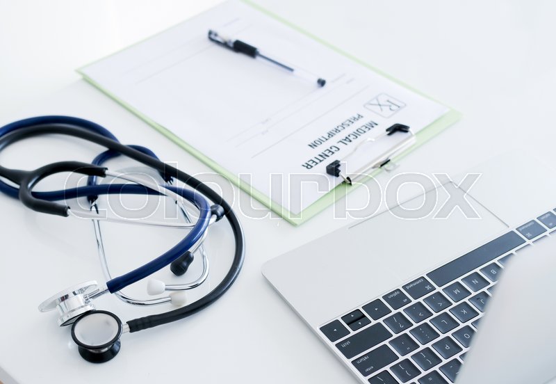 Close up stethoscope on working table ... | Stock image | Colourbox