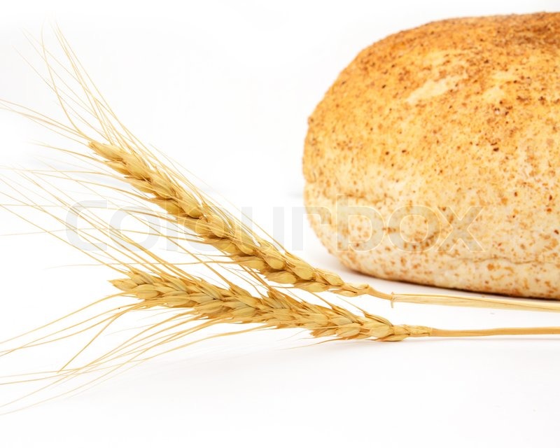 Wheat and bread on a white background | Stock Photo | Colourbox