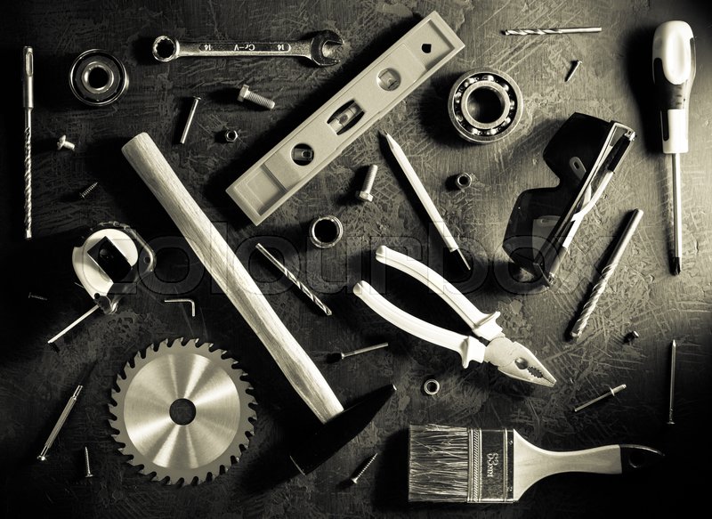 Set of tools and instruments on black ... | Stock image | Colourbox