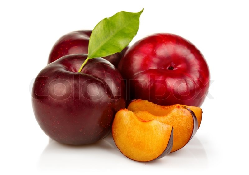 Ripe plums fruit with slices isolated ... | Stock image | Colourbox