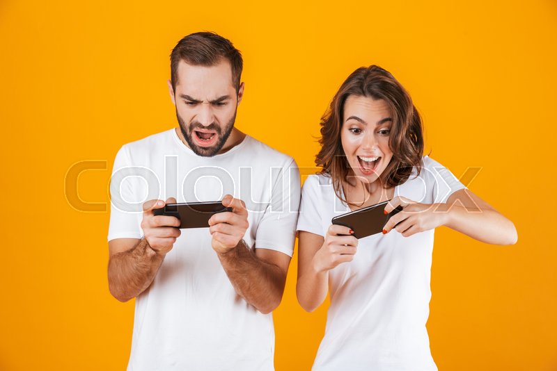Image of joyful man and woman playing ... | Stock image | Colourbox