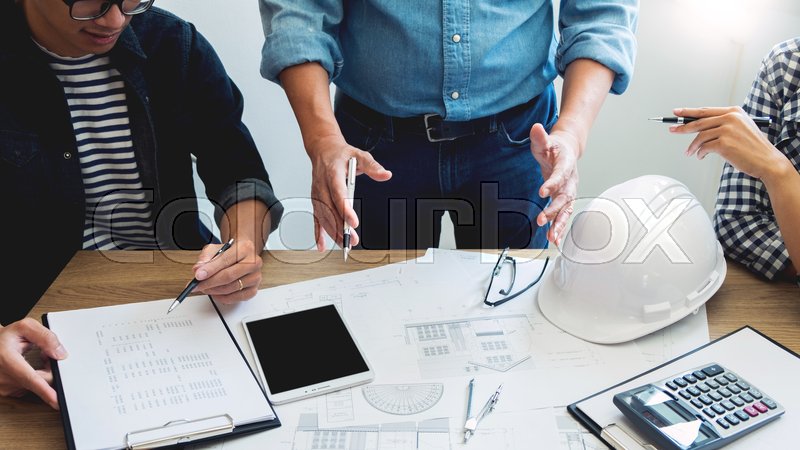 Engineer discussing meeting working on ... | Stock image | Colourbox