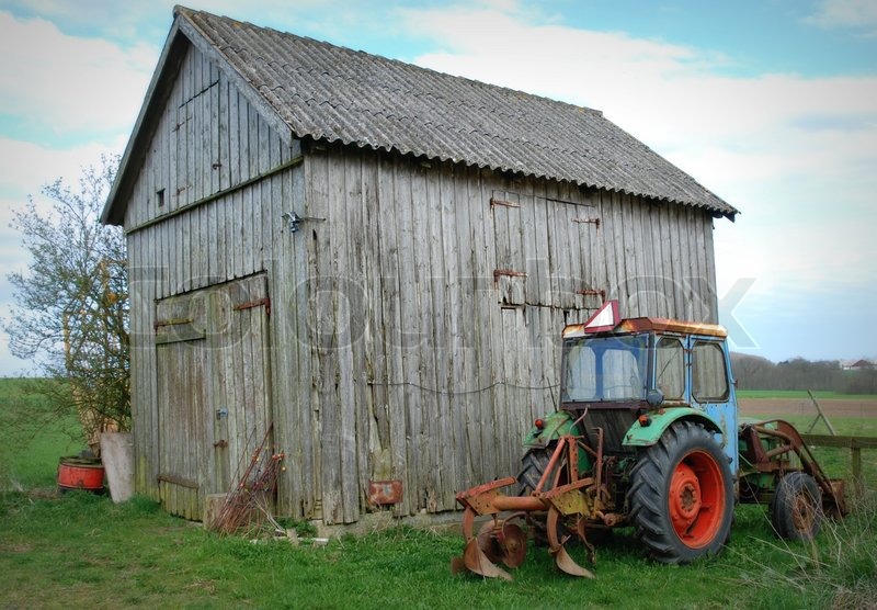 Typical Farm Scene - Old Tractor and ... | Stock image | Colourbox