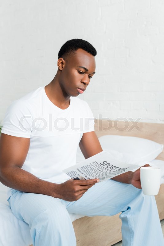 Black Man Reading Newspaper