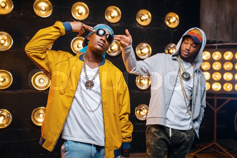 Two black rappers in caps, artists ... | Stock image | Colourbox