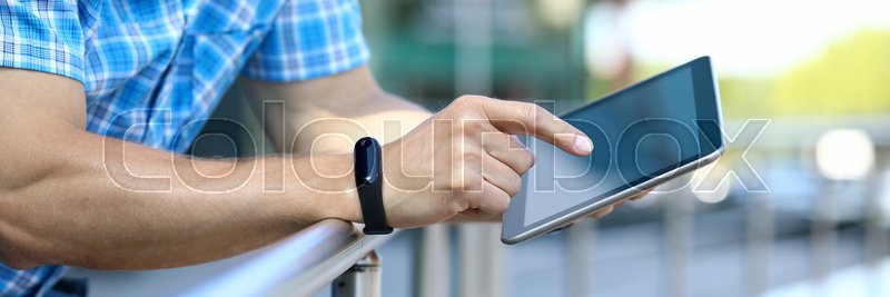 Male businessman hold tablet in hand ... | Stock image | Colourbox