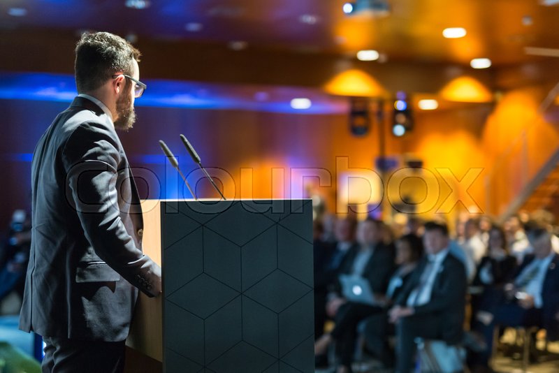 Speaker giving a talk on corporate ... | Stock image | Colourbox