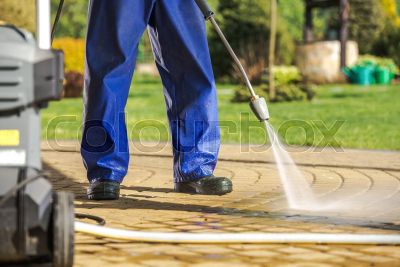 Worker and Pressure Washer. Men Wearing ... | Stock image | Colourbox