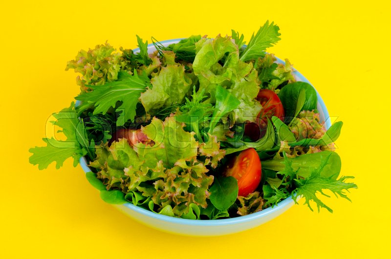 Bowl of mixed salad on bright, color ... | Stock image | Colourbox