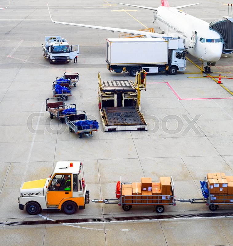 Airplanes, gangway, truck, parcels ... | Stock image | Colourbox