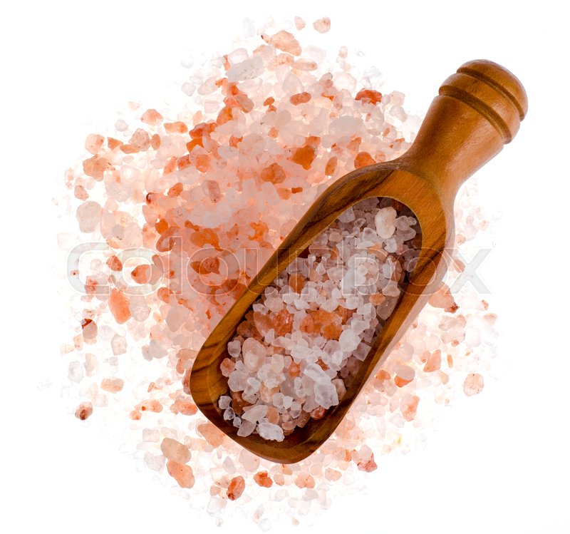 Sea salt in wooden scoop isolated on ... | Stock image | Colourbox