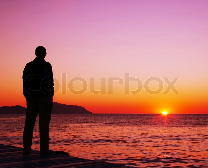 Man looking on sunset | Stock image | Colourbox