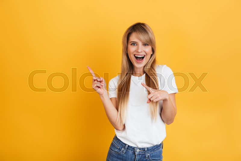 Image of a pretty happy pleased young ... | Stock image | Colourbox