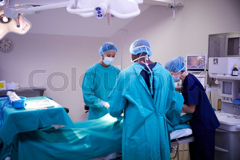 Surgical Team Working On Patient In ... | Stock image | Colourbox