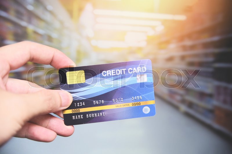 Credit card shopping in the supermarket ... | Stock image | Colourbox