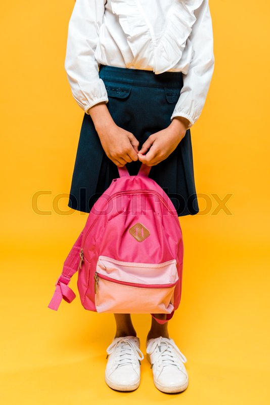 Cropped view of schoolkid holding ... | Stock image | Colourbox