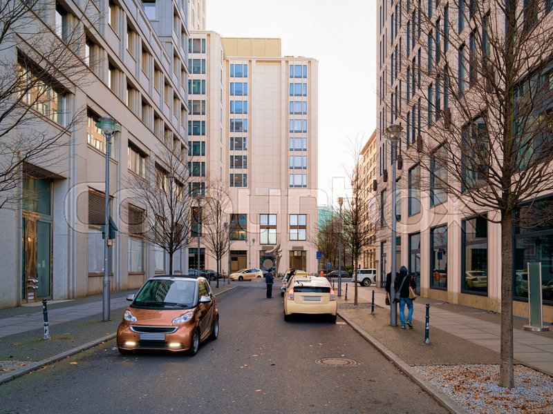 Street with cas and modern building ... | Stock image | Colourbox