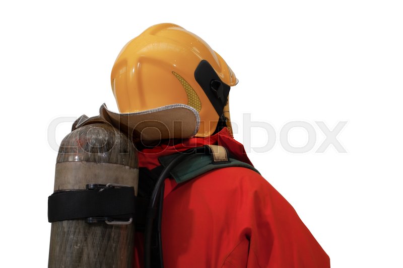 Firefighter with mask wearing safety ... | Stock image | Colourbox