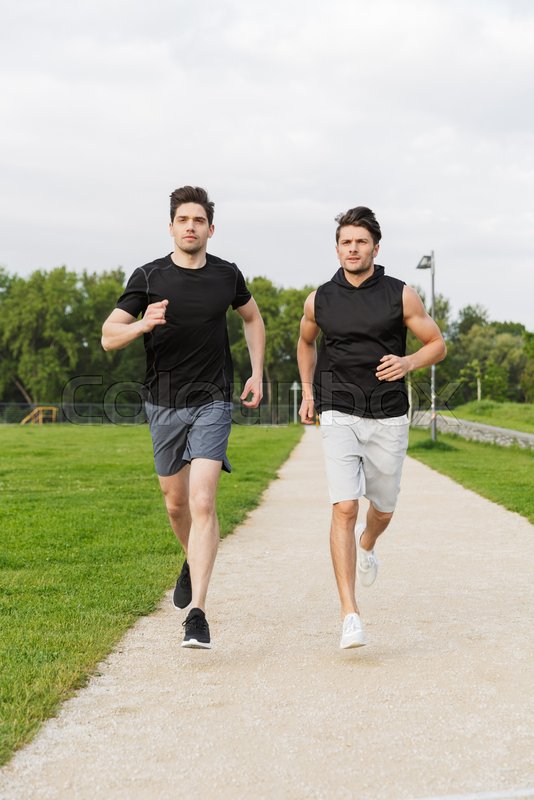 Image of two young guys in sportswear ... | Stock image | Colourbox